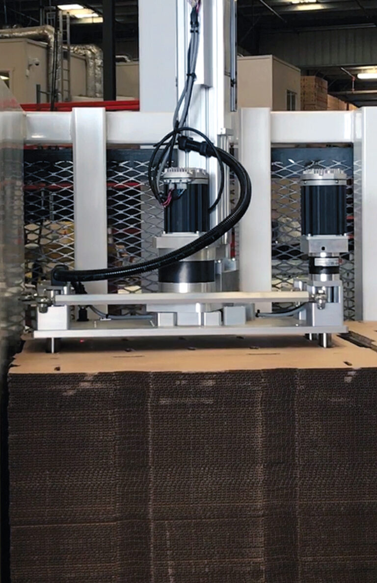 Simplifying overhead machine tending with long-travel automation